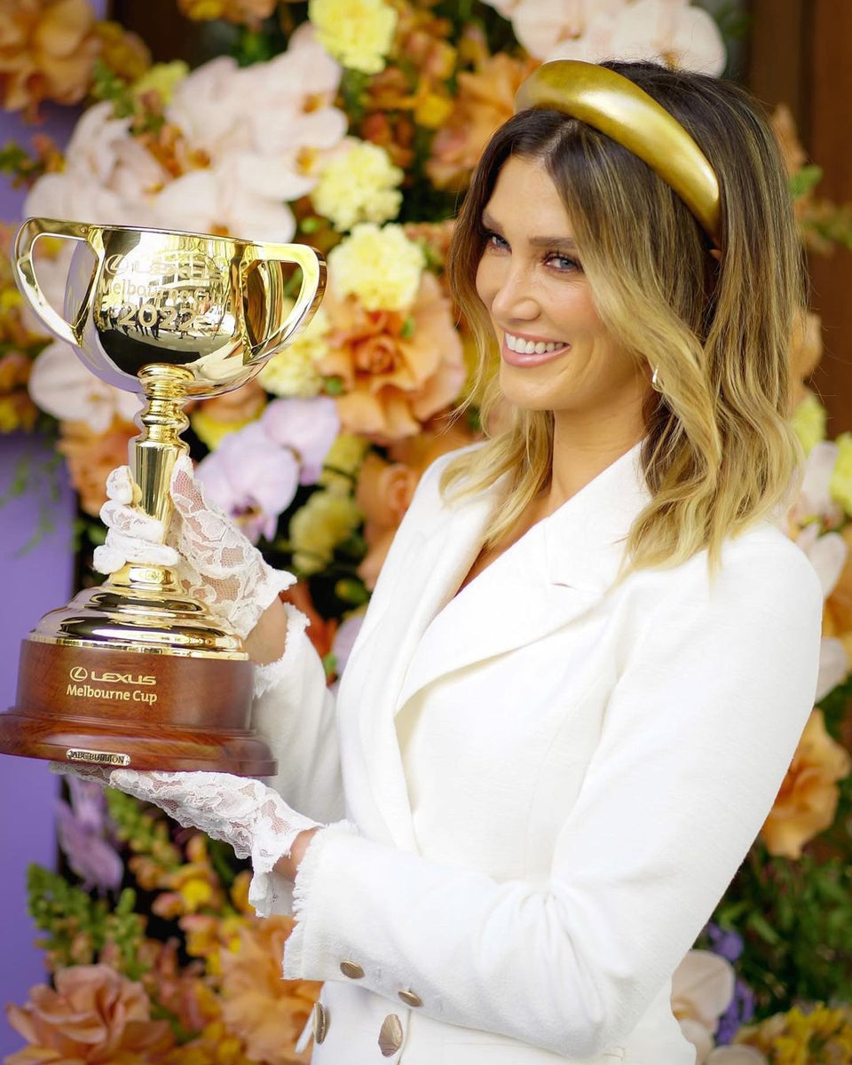 Delta Goodrem in our "MONICA" Gold Padded Headband – FORD MILLINERY