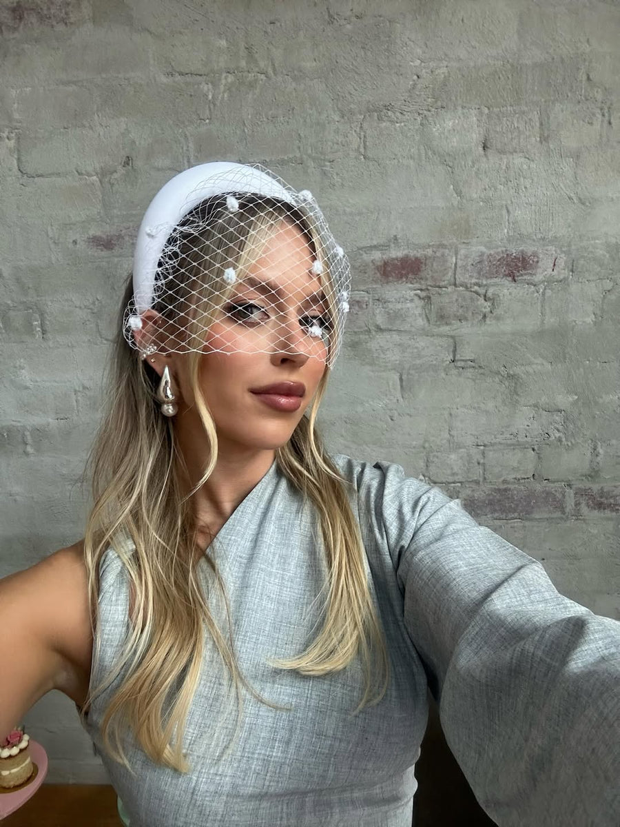 Content creator Georgia Hayes wears "KATY" in white – FORD MILLINERY