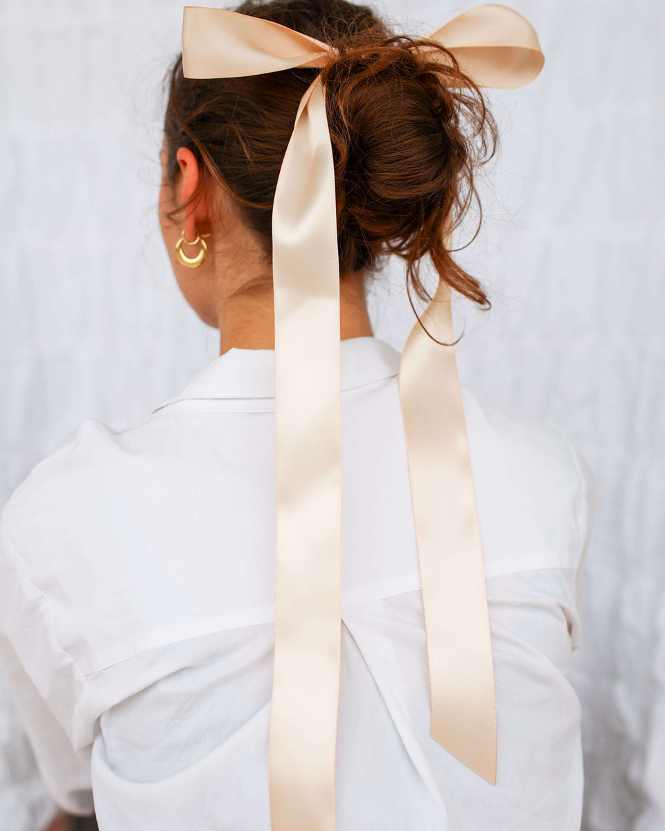 Length of Ivory Satin Ribbon by FORD MILLINERY