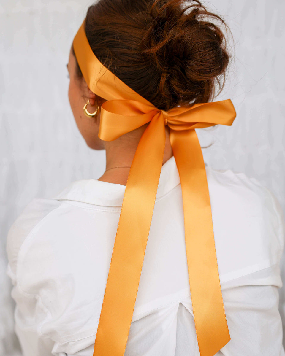 Length of Ivory Satin Ribbon by FORD MILLINERY